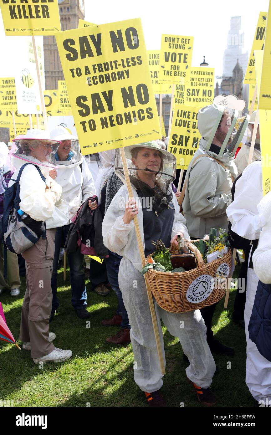 A group of beekeepers and enthusiasts including fashion designer ...