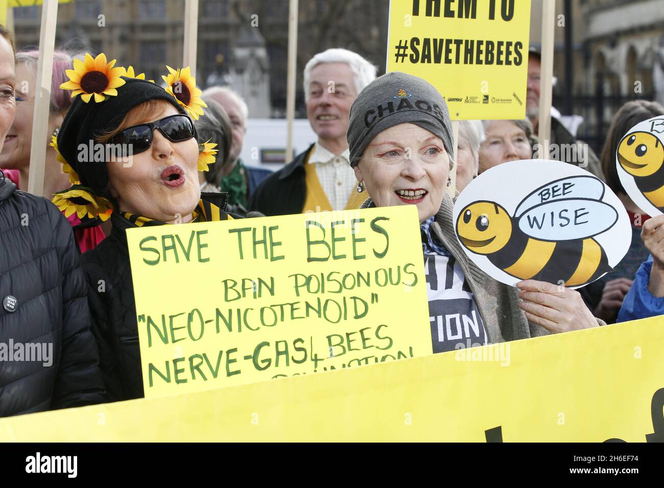 A group of beekeepers and enthusiasts including fashion designer ...