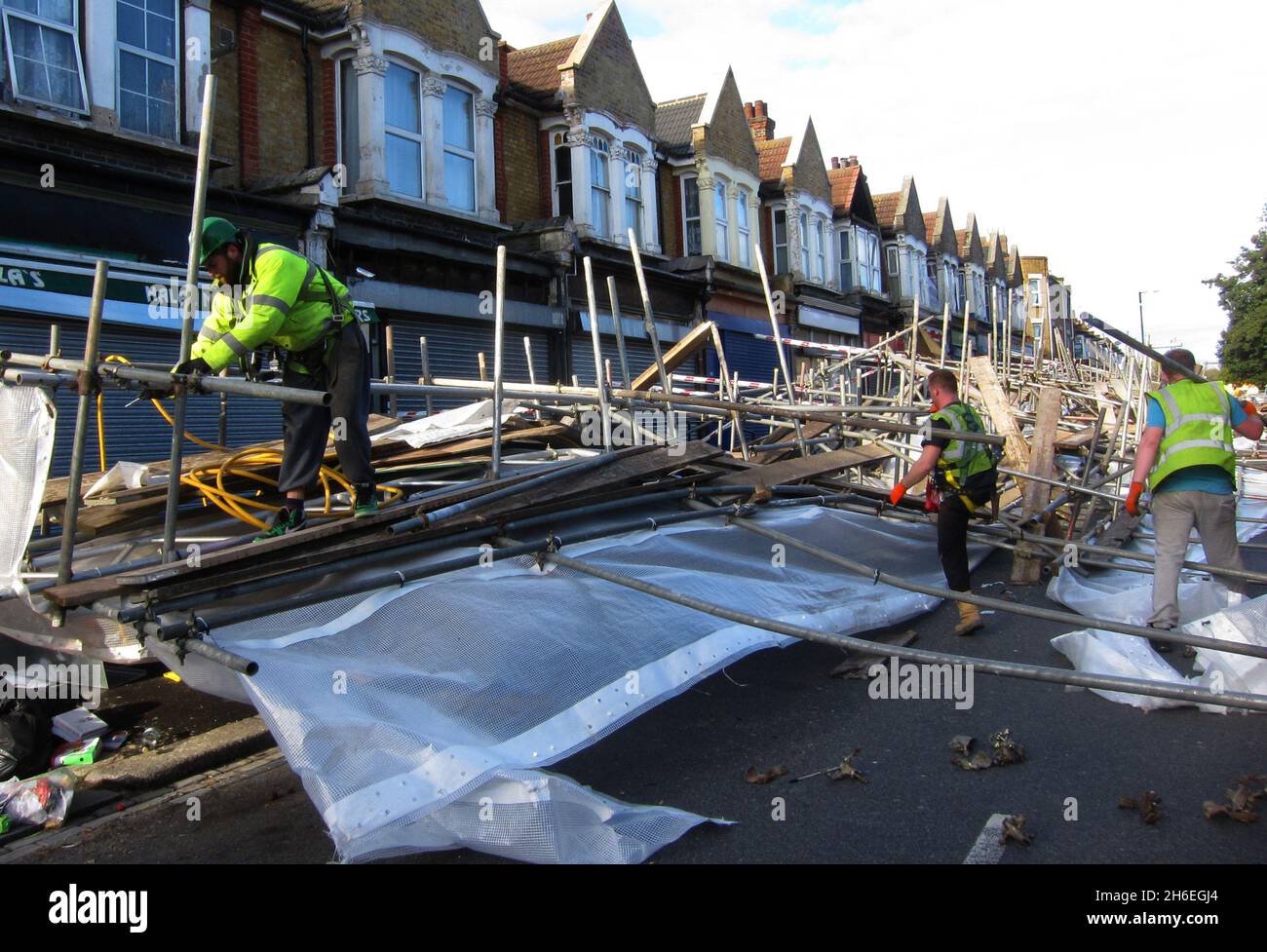 Scaffolding collapsed on top of cars in a street in Leyton, East London ...