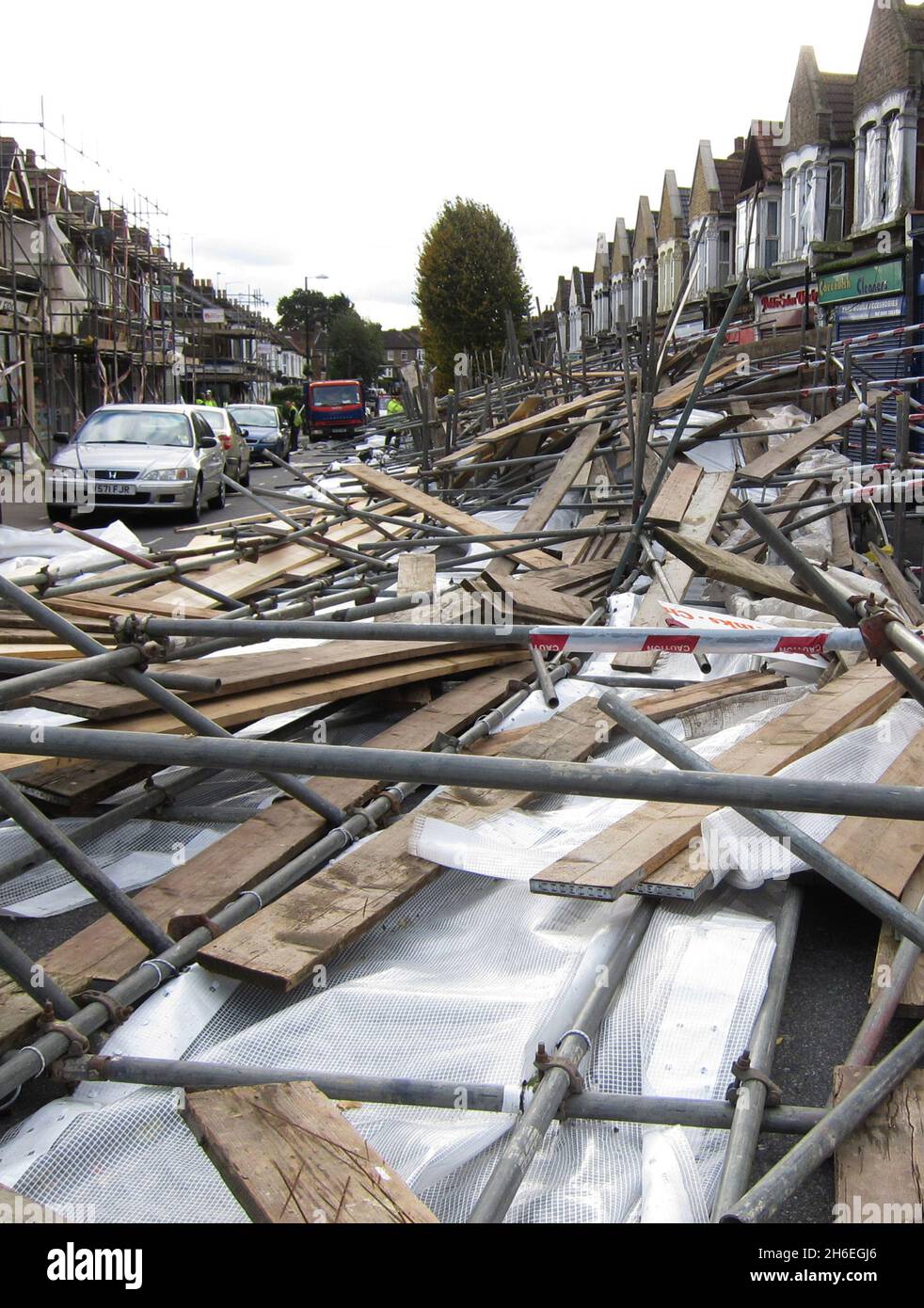 Scaffolding collapsed on top of cars in a street in Leyton, East London ...