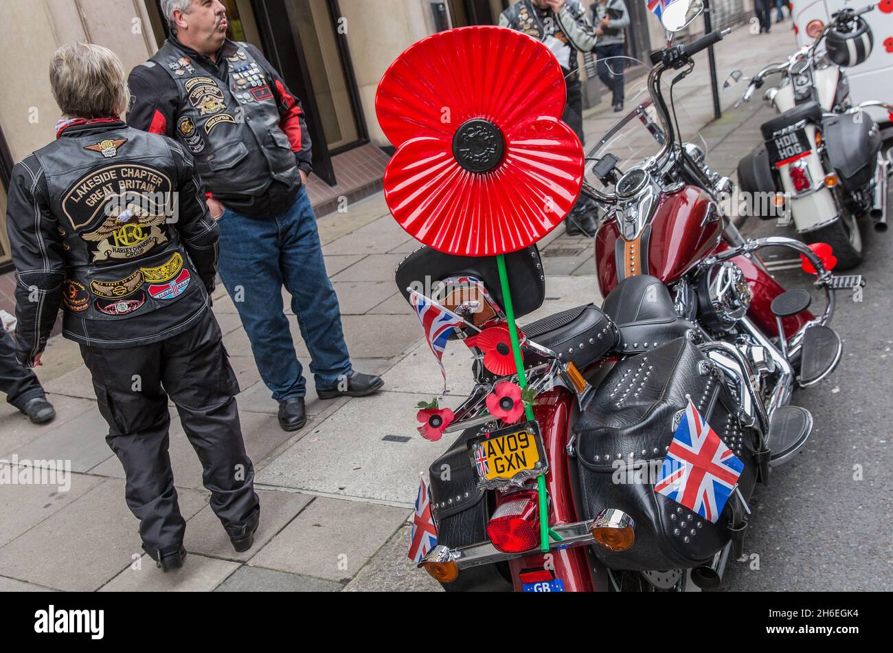 A group of motor cyclists show their respect by the Field of ...