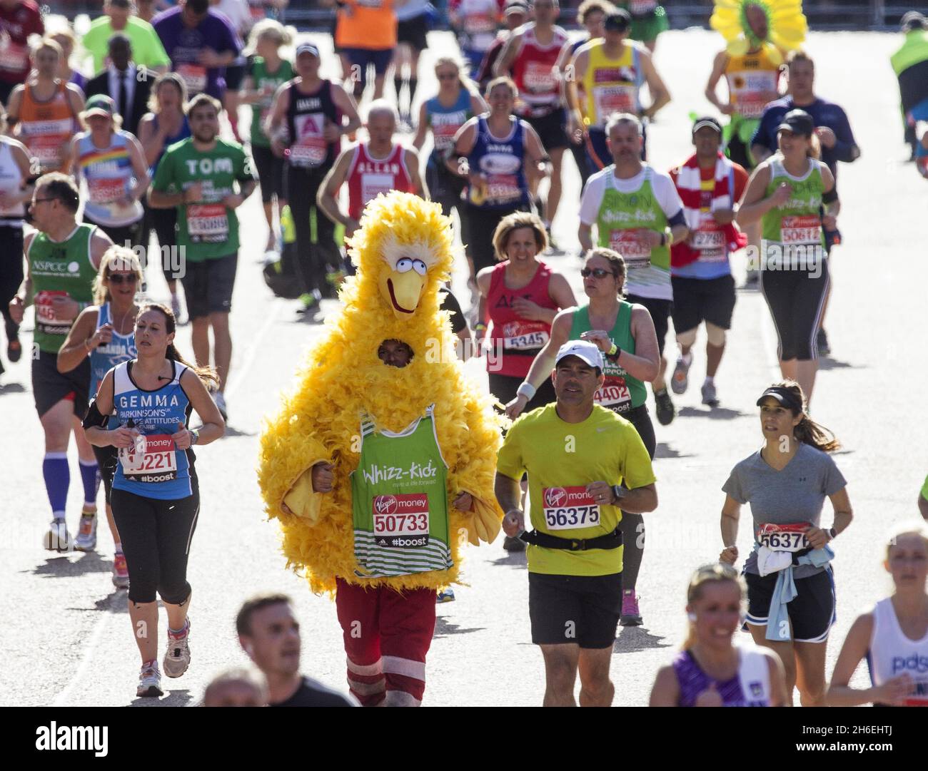 A runner dressed as Big Bird at the finish line at the London Marathon ...
