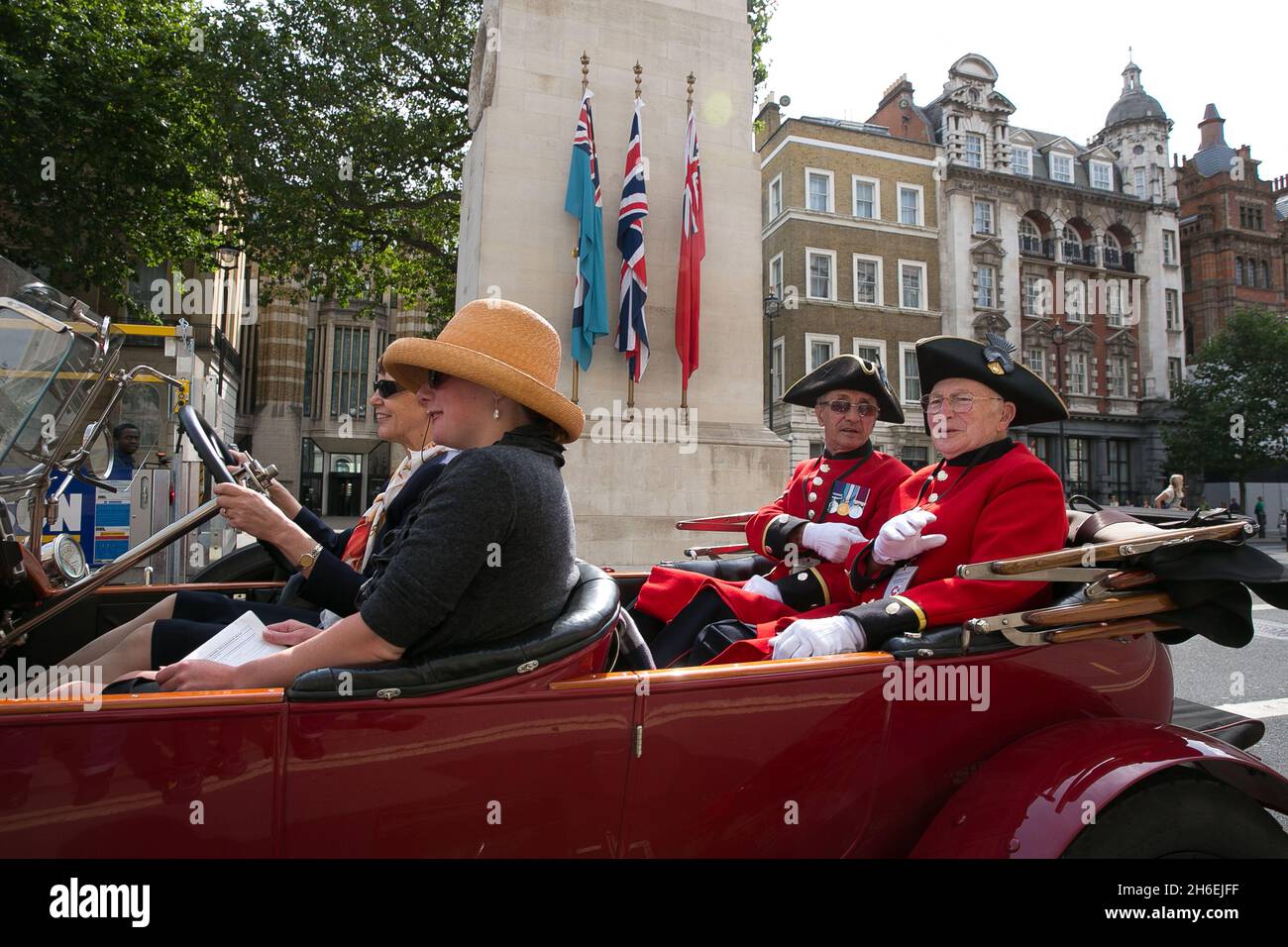 A World War One centenary parade involving classic cars passes the ...