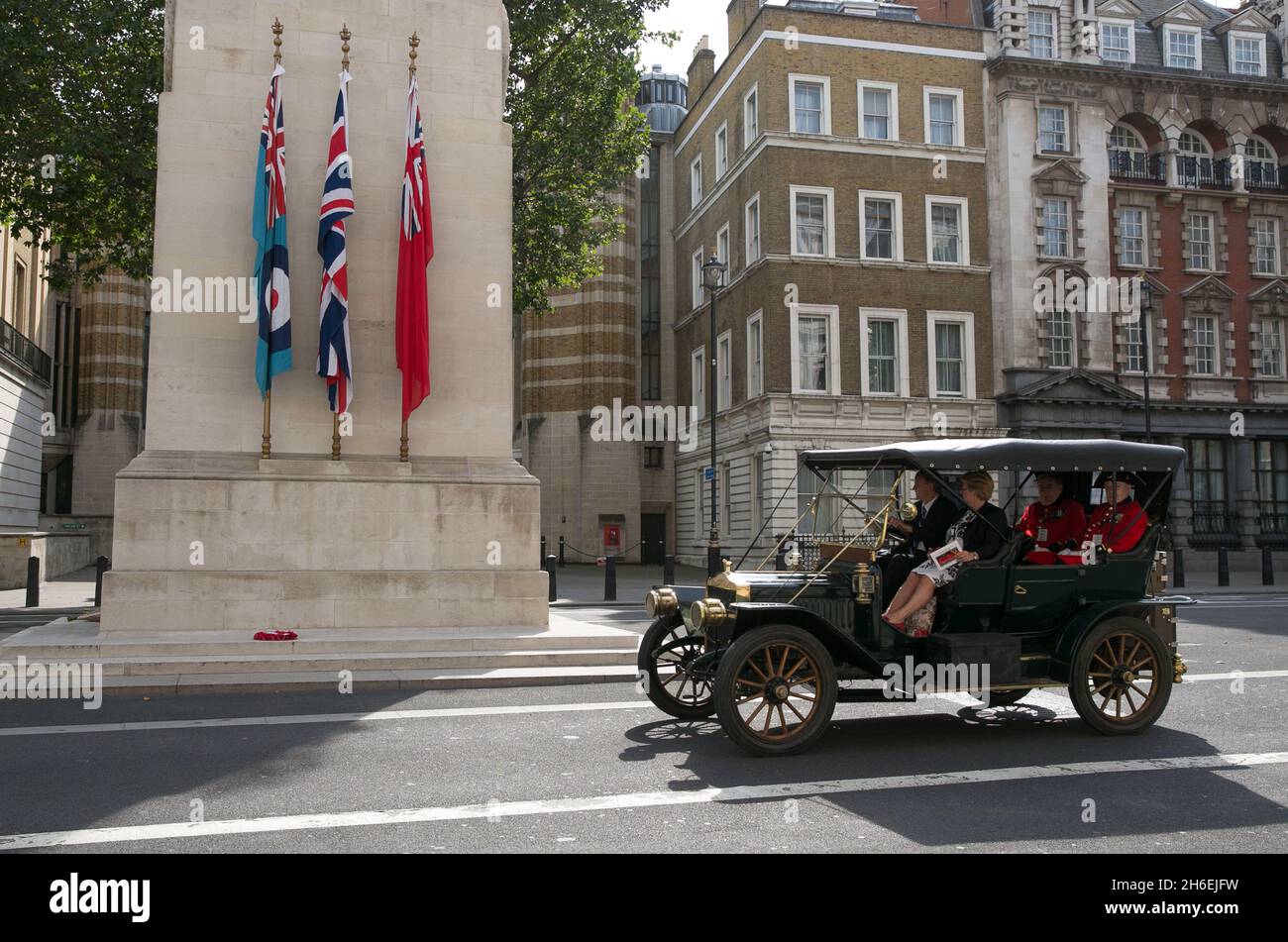 A World War One centenary parade involving classic cars passes the ...