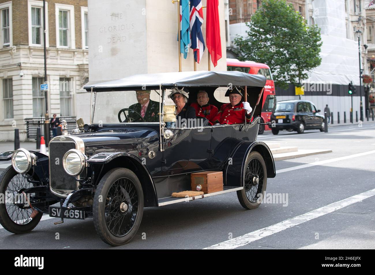 A World War One centenary parade involving classic cars passes the ...