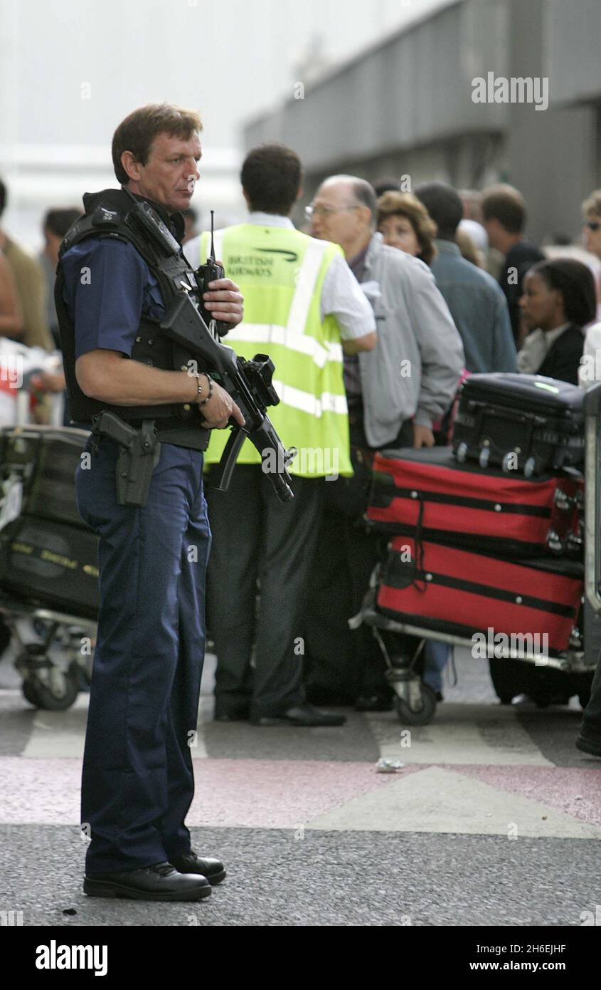 File Photo of armed police officers at Heathrow Airport in London Stock ...