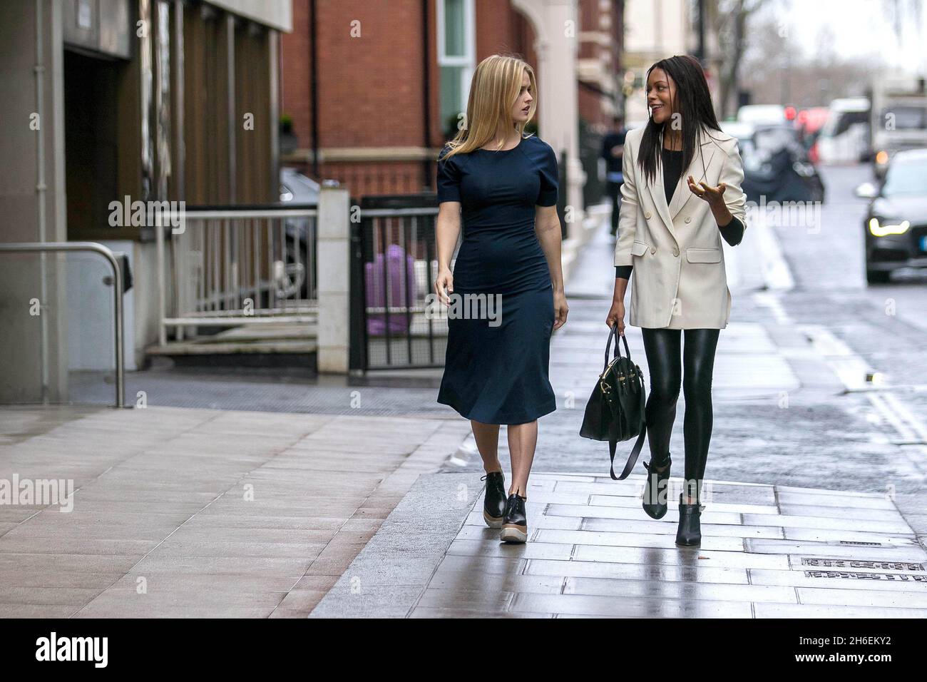 Friends Naomie Harris and Alice Eve (actors) in Mayfair, London today ...