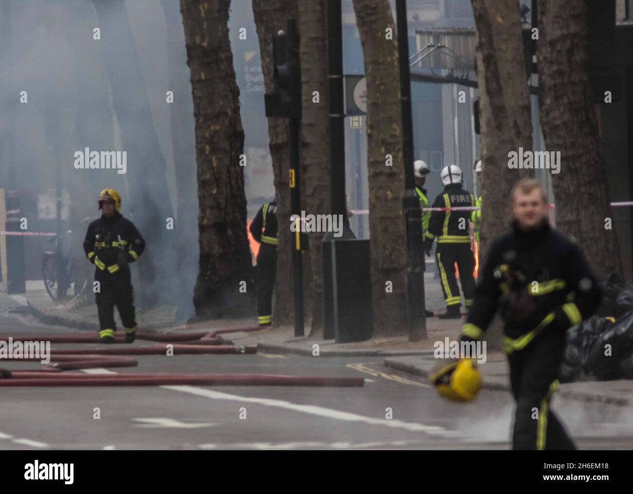 Working with a fire hi-res stock photography and images - Alamy
