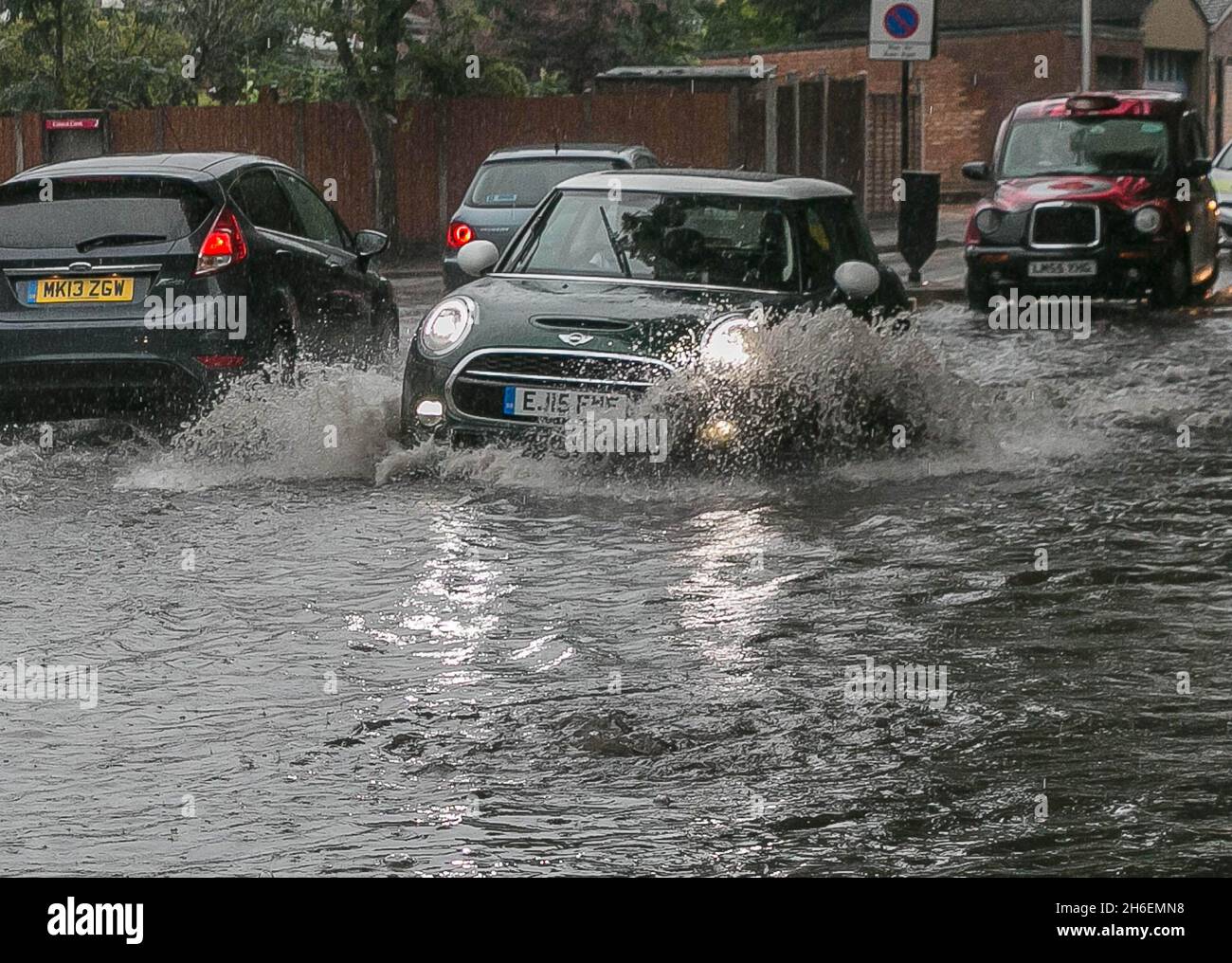 A flooded road in Leytonstone in East London as forecasters are tonight ...