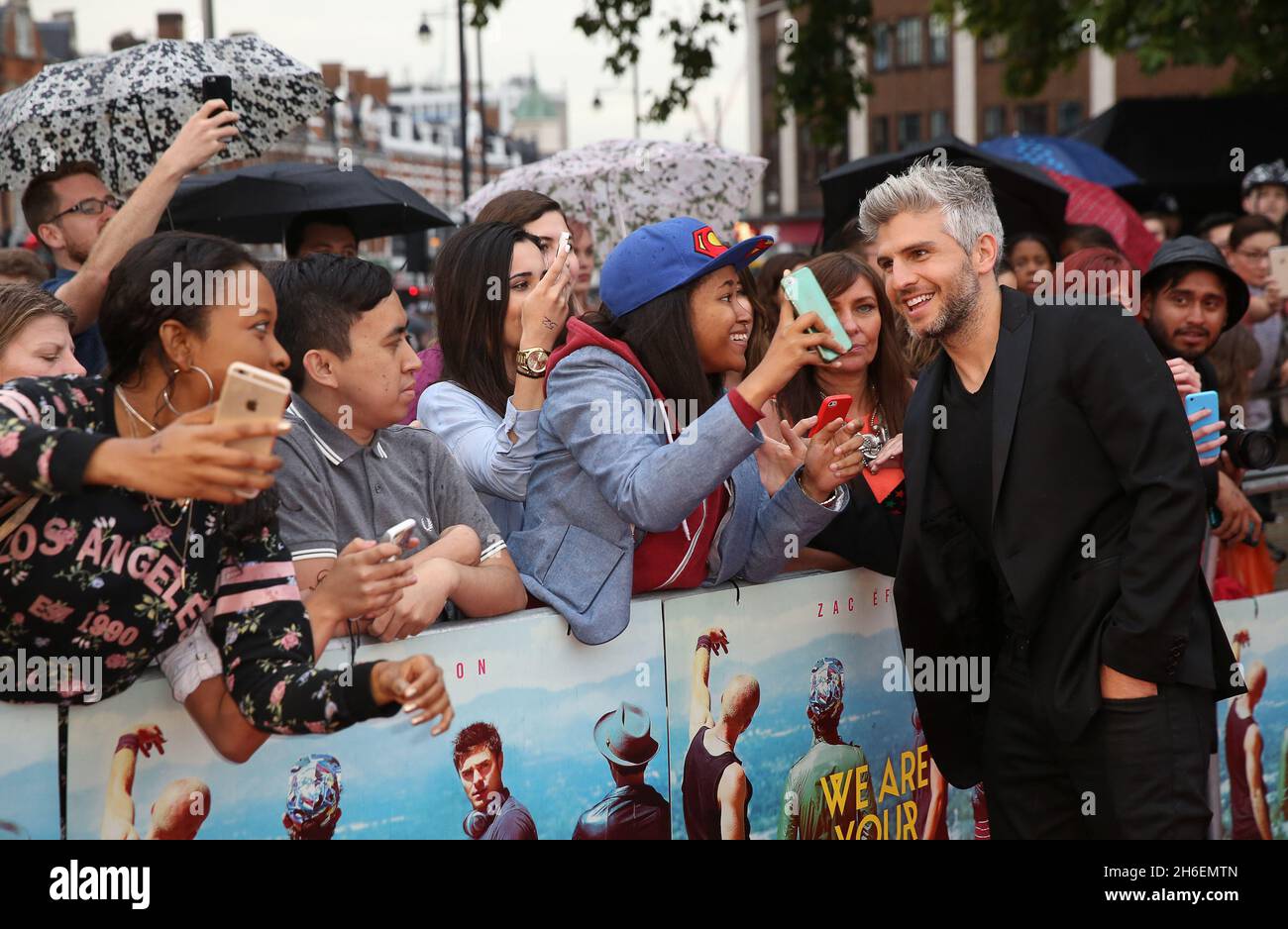 Max Joseph poses for photographs with fans whilst arriving for the ...