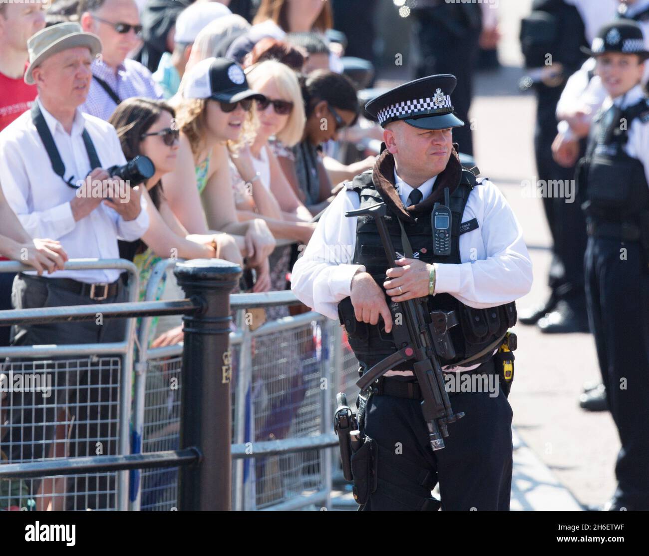 Police watch over Trooping the Colour on The Mall, London Stock Photo ...