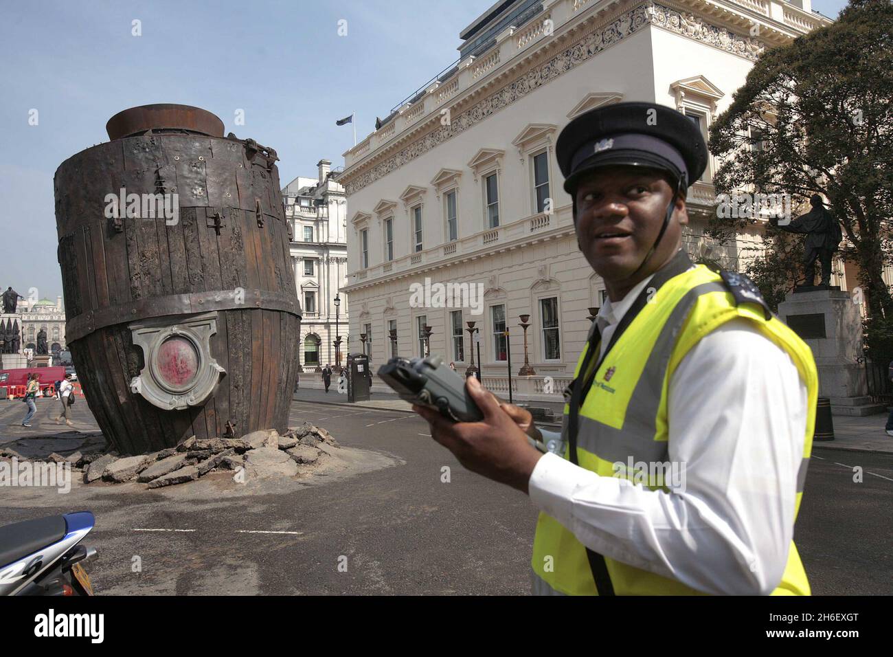 A giant smoking rocket was buried in the street in Waterloo place ...