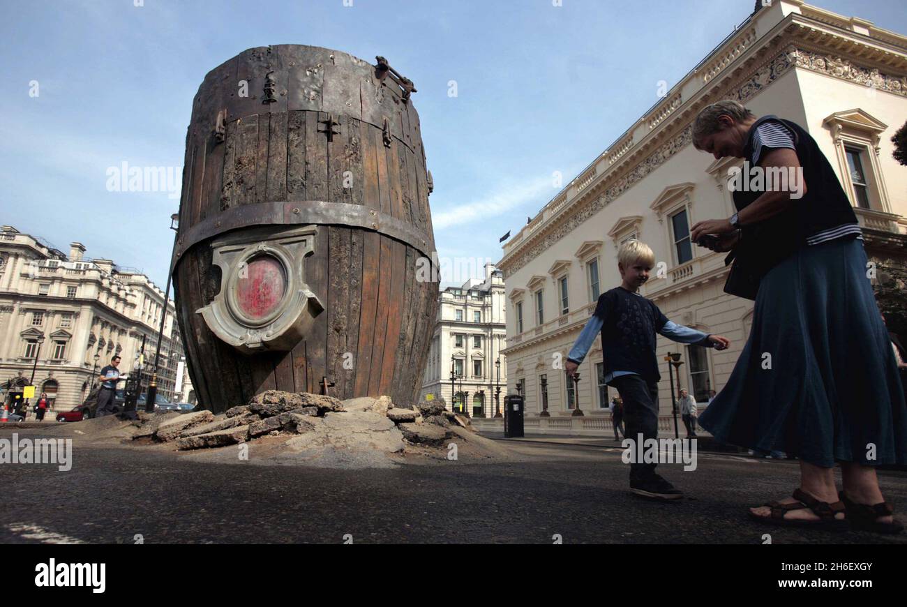 A giant smoking rocket was buried in the street in Waterloo place ...