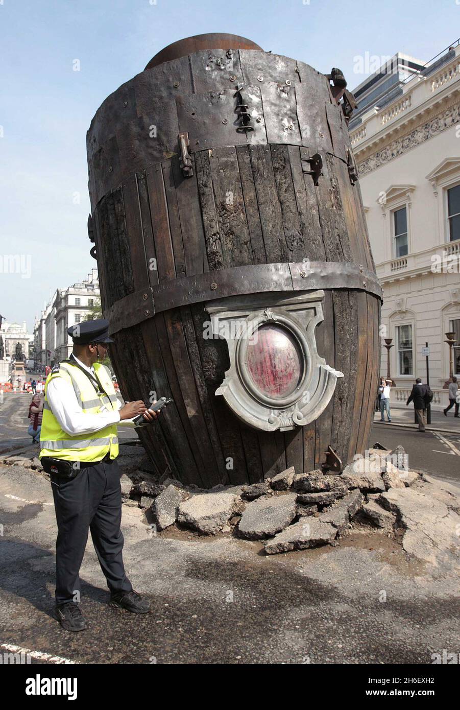 A giant smoking rocket was buried in the street in Waterloo place ...