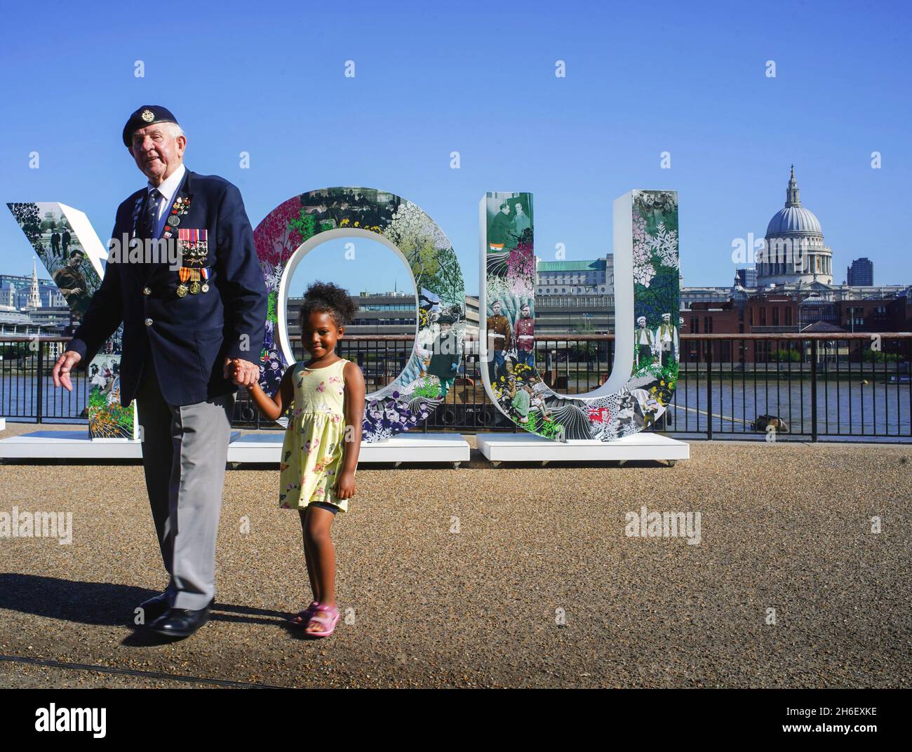 85 year old Veteran Tom Weatherall and 5 year old Maraki Tewodros view ...