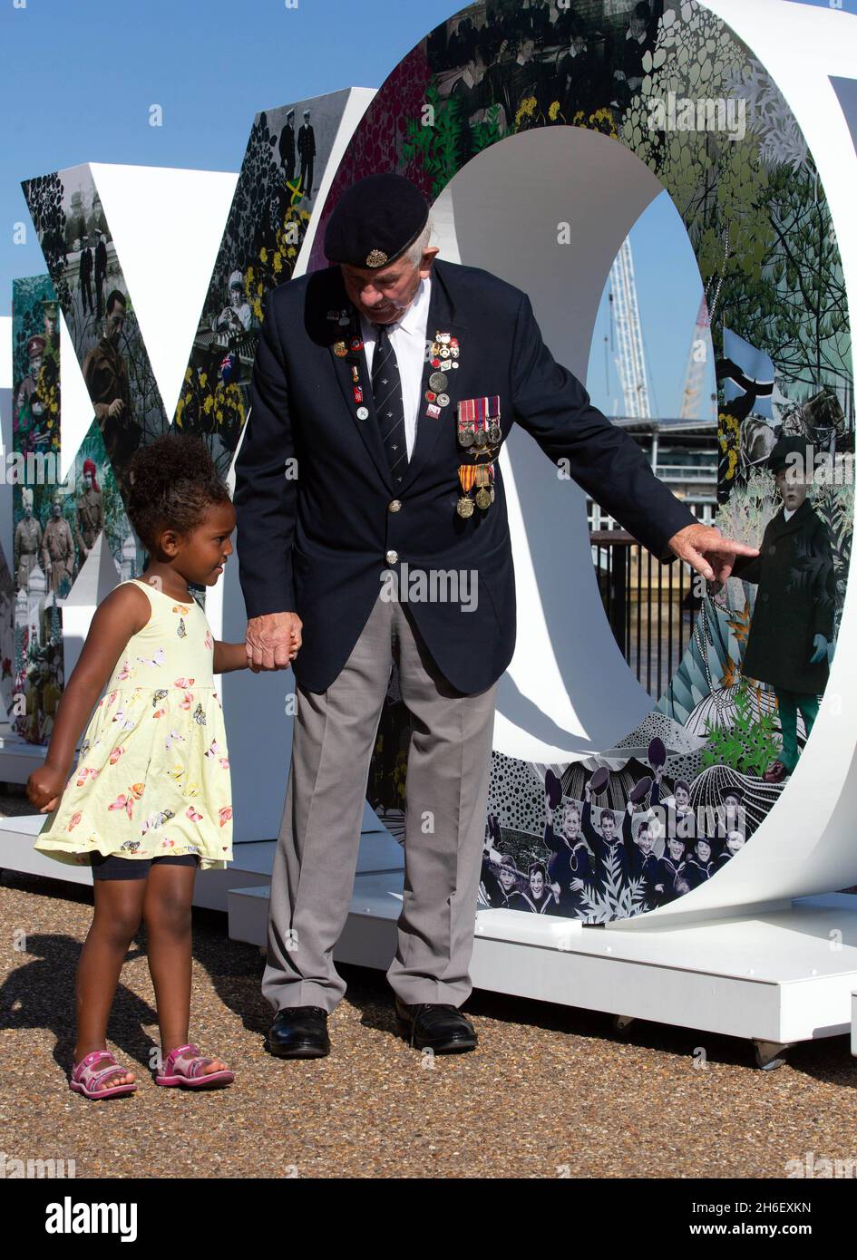 85 year old Veteran Tom Weatherall and 5 year old Maraki Tewodros view ...