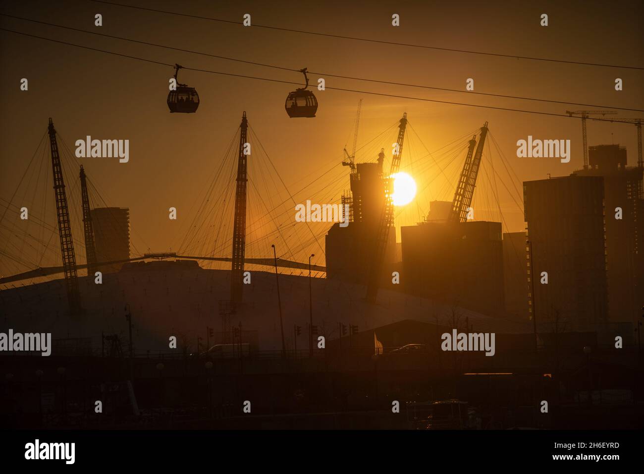 The sunset over the The O2 arena in London after the hottest February ...