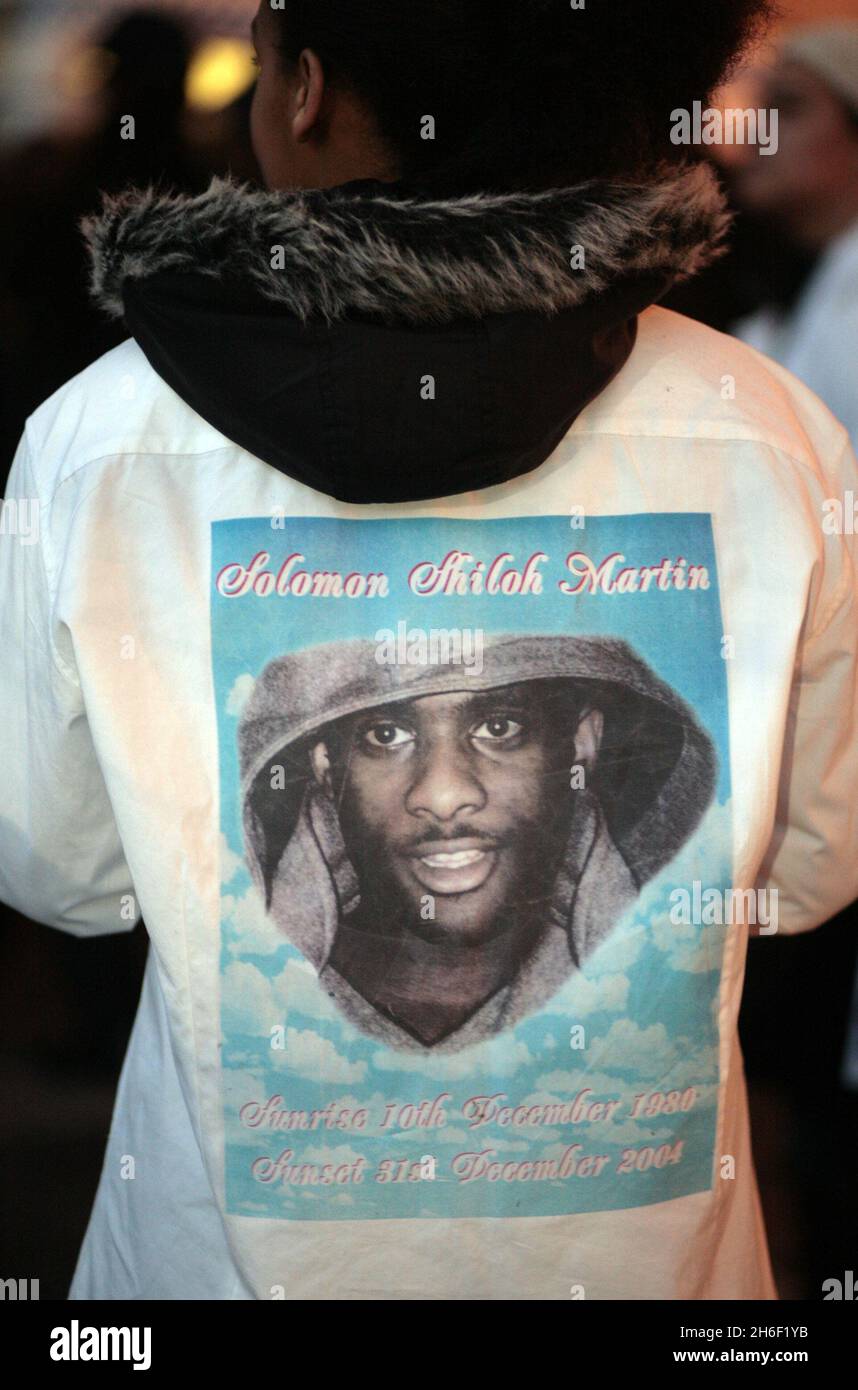 A cousin of 2004 murder victim Solomon Martin wears a tshirt depicting ...