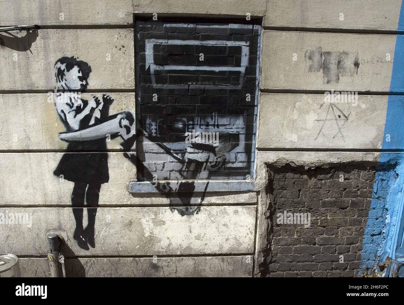 London street artist Banksy's new work in London, EC1 shows a young ...