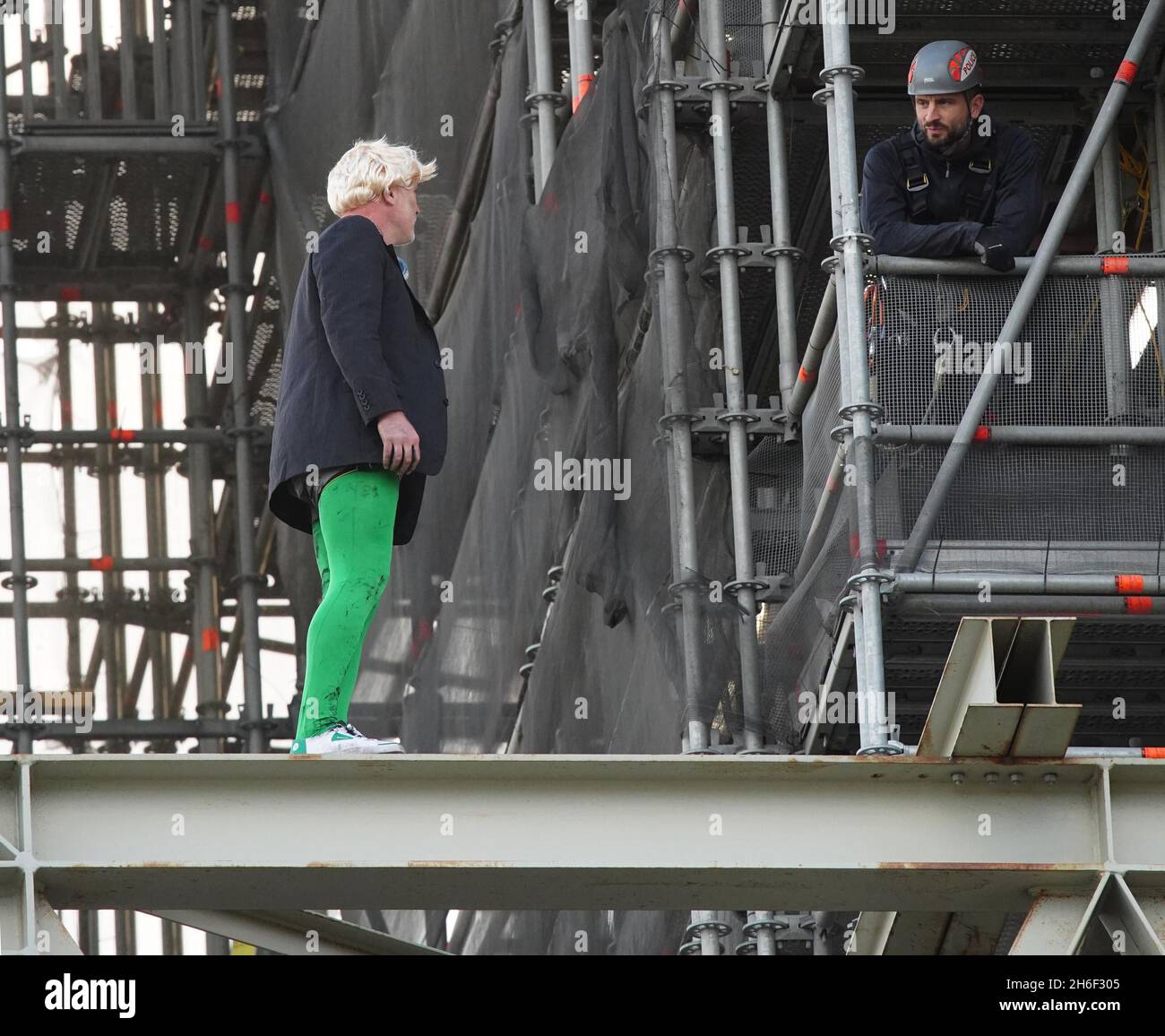 Extinction Rebellion protestor scales Big Ben tower dressed as Boris ...