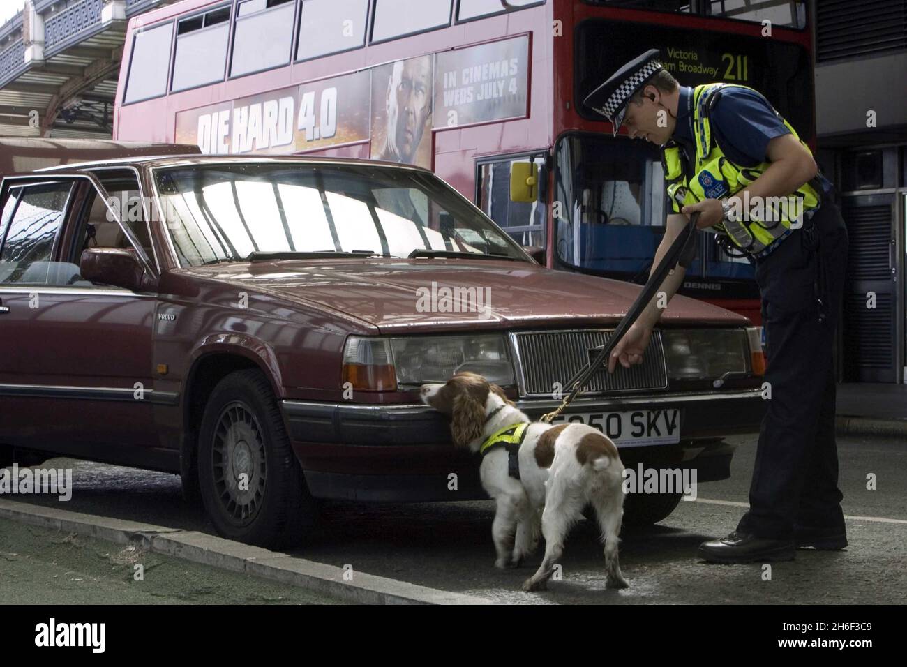 Police officers search cars at Waterloo station in London this ...