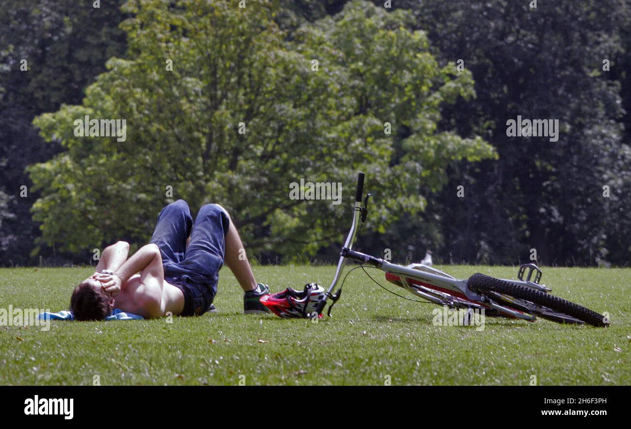 Sunbathers in Regents Park, central London today, July 24, 2007, as the ...