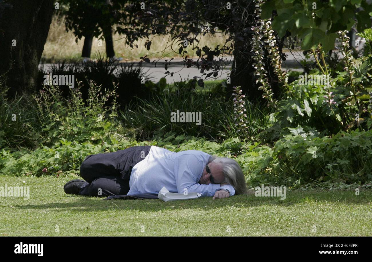Sunbathers in Regents Park, central London today, July 24, 2007, as the ...