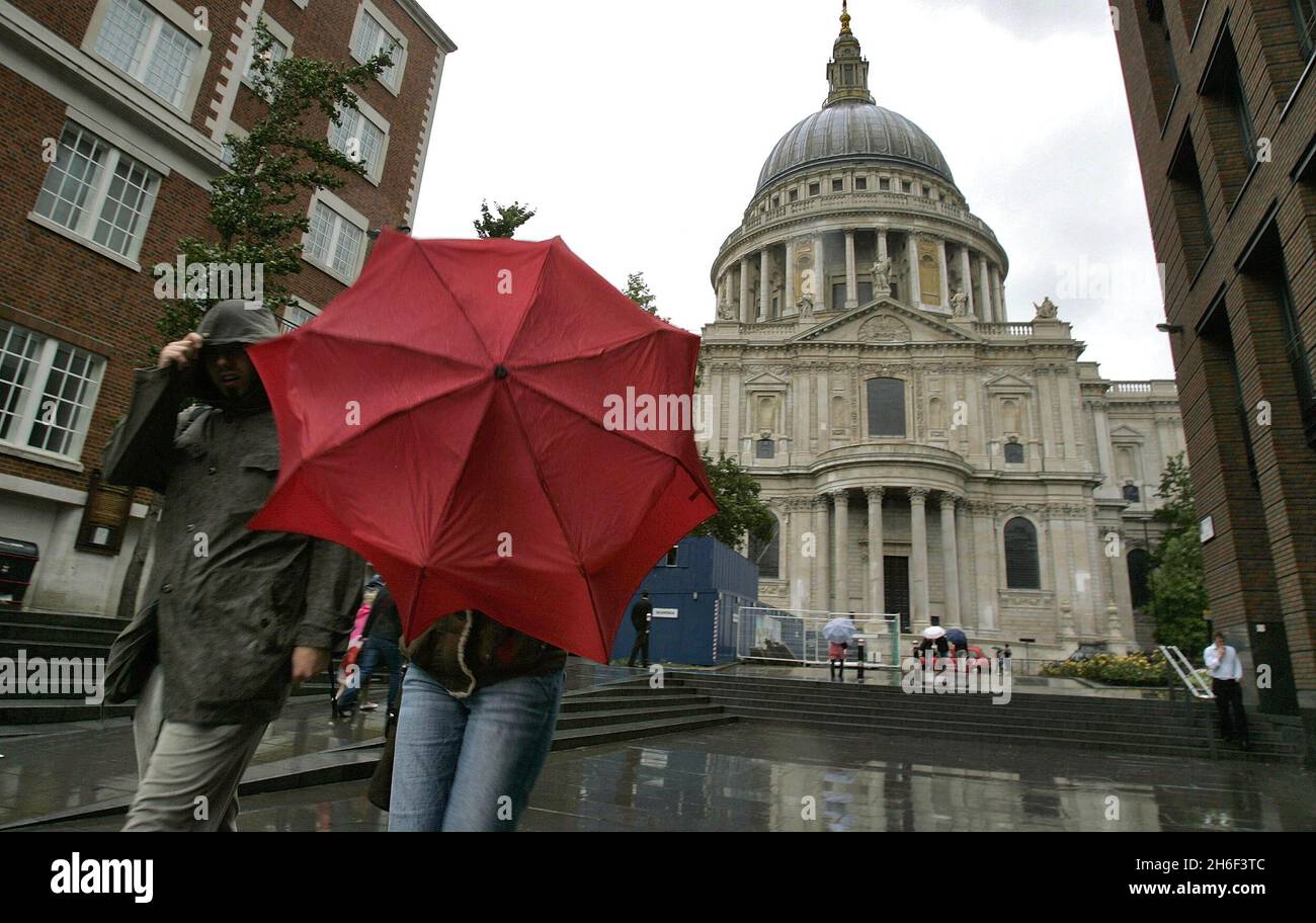 Rain and wind hit central London in England Stock Photo - Alamy