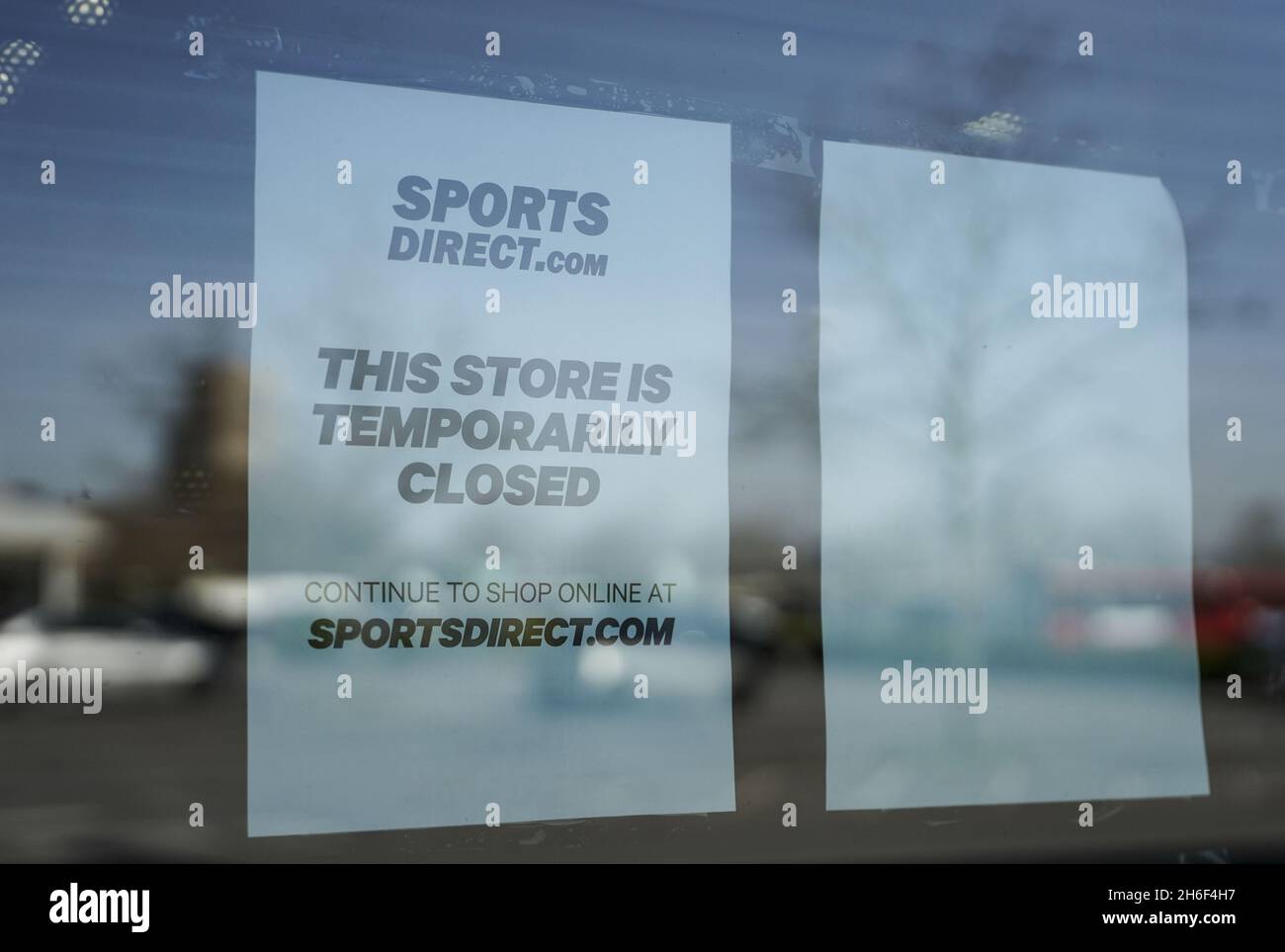 A notice in the window of Sports Direct in Leyton, London, informing ...