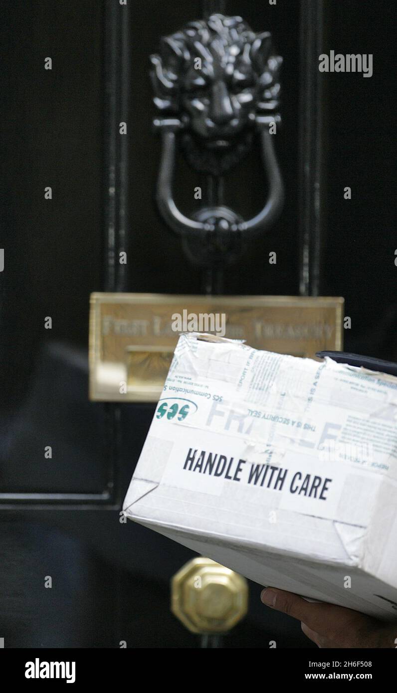 File photo dated 10/05/2007 of a parcel with 'handle with care' written ...