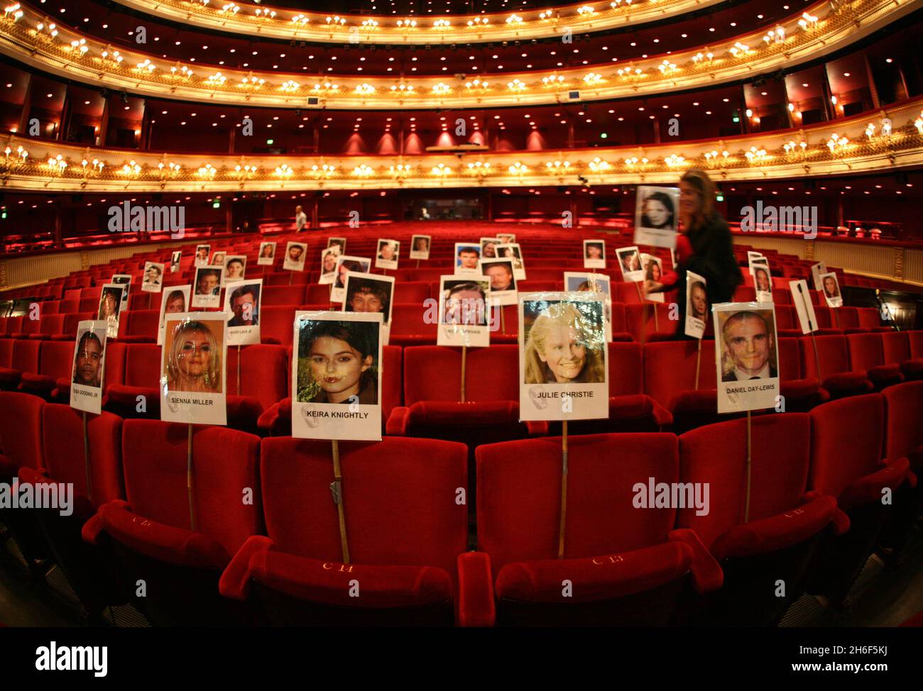 Cards with headshots of nominees and award presenters are placed on ...