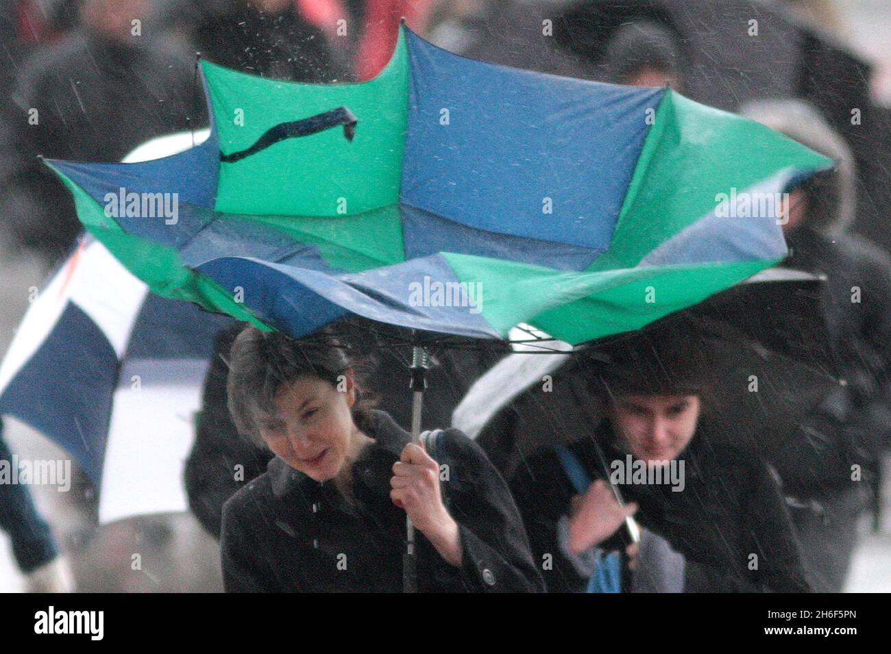 As severe storms move across the UK, wind and rain batter commuters on ...