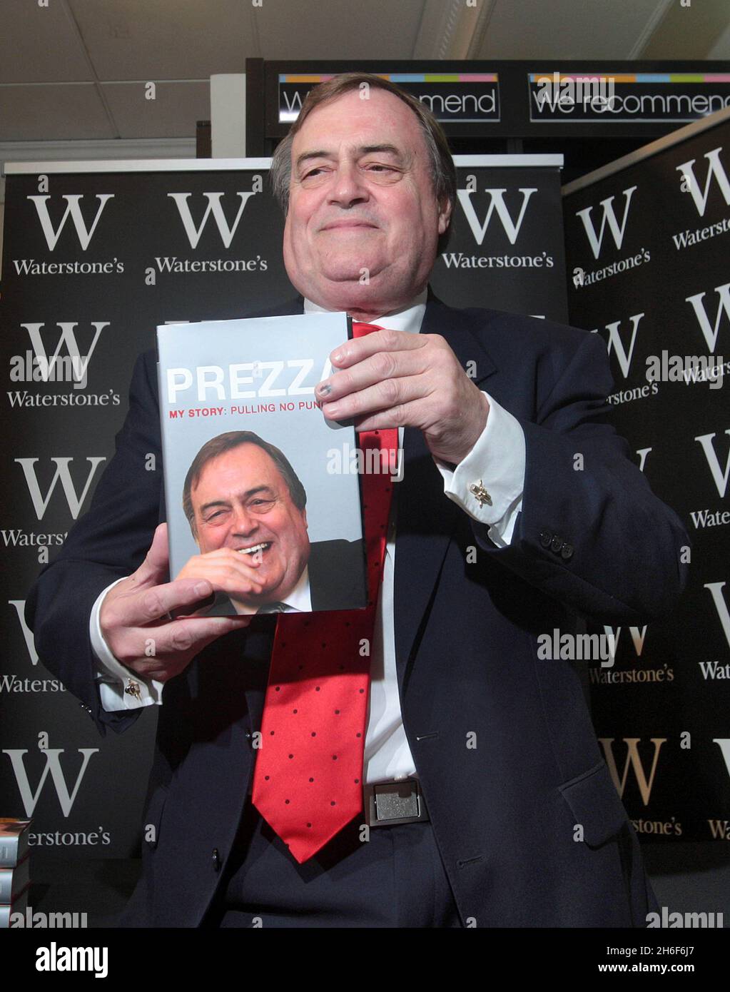 Former deputy Prime Minister John Prescott signs copies of his ...