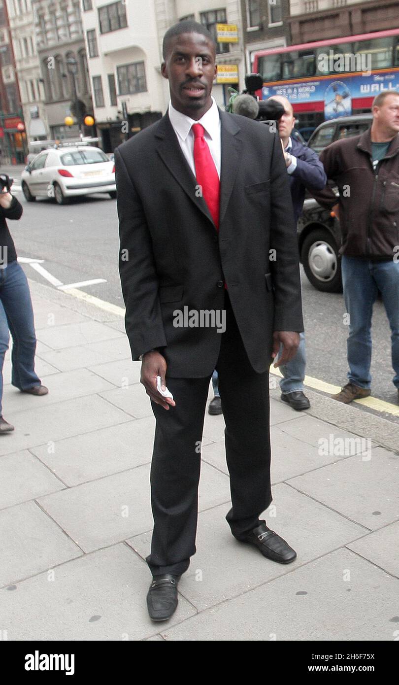 Dwain Chambers leaves the High Court in London, after he lost his ...