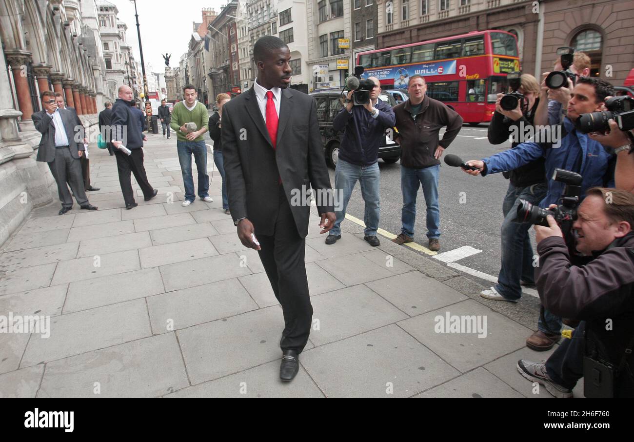 Dwain Chambers leaves the High Court in London, after he lost his ...