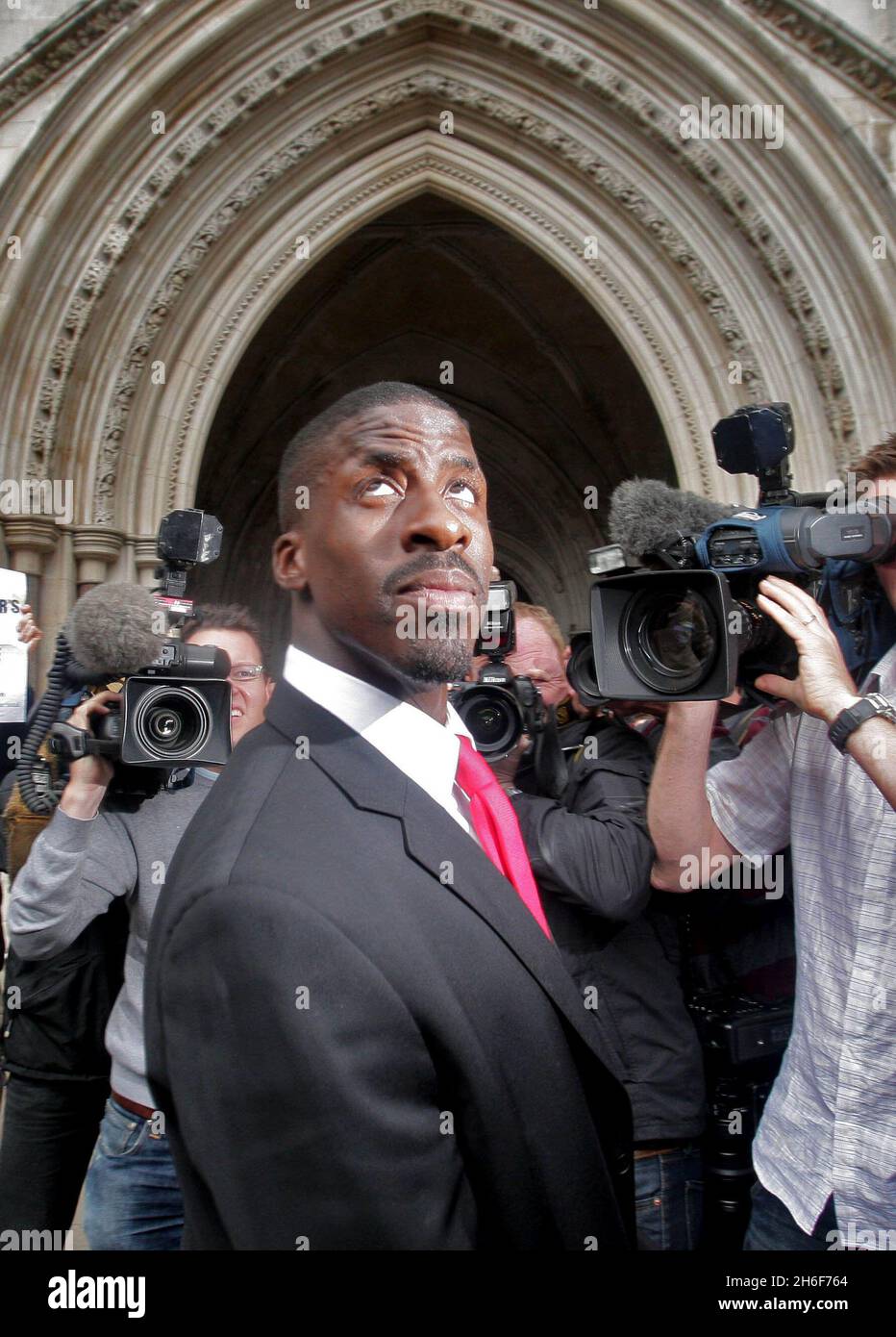 Dwain Chambers leaves the High Court in London, after he lost his ...