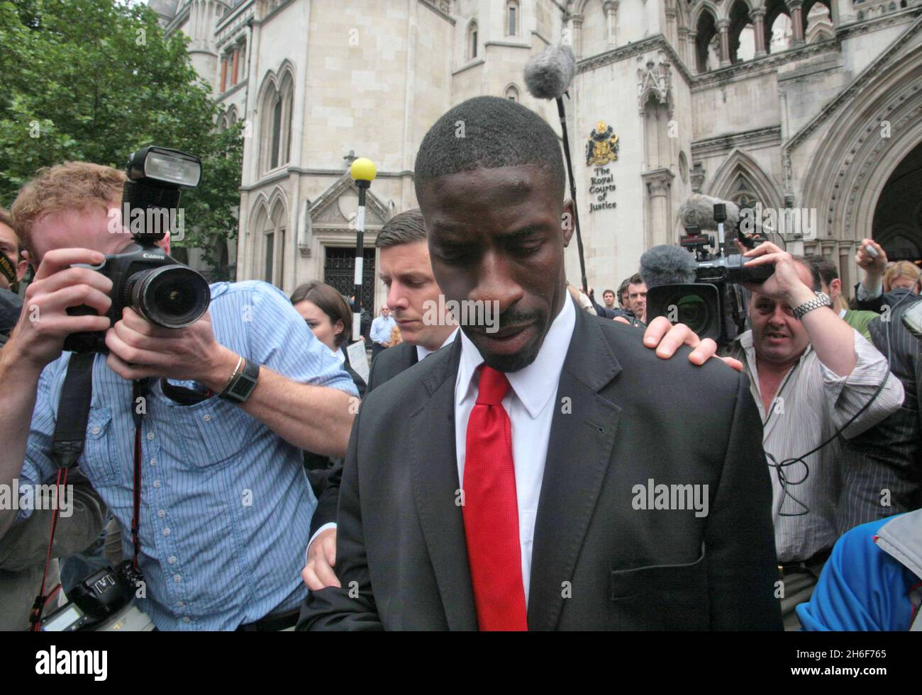 Dwain Chambers leaves the High Court in London, after he lost his ...