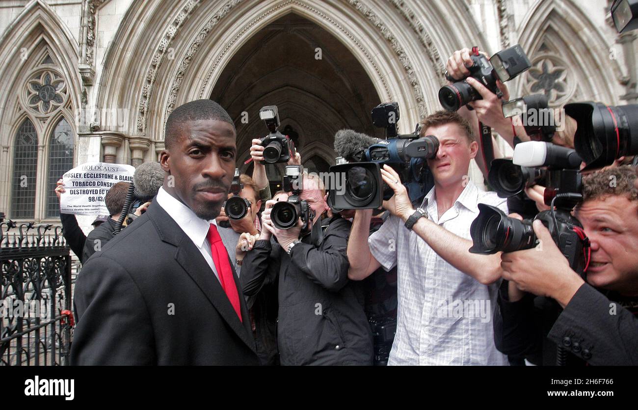 Dwain Chambers leaves the High Court in London, after he lost his ...