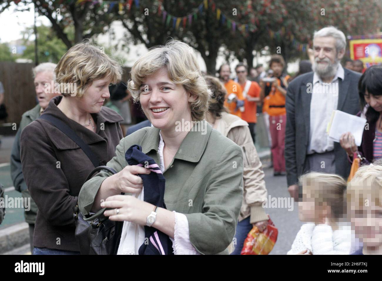 Ruth Kelly and her family attend a street theatre procession of The ...