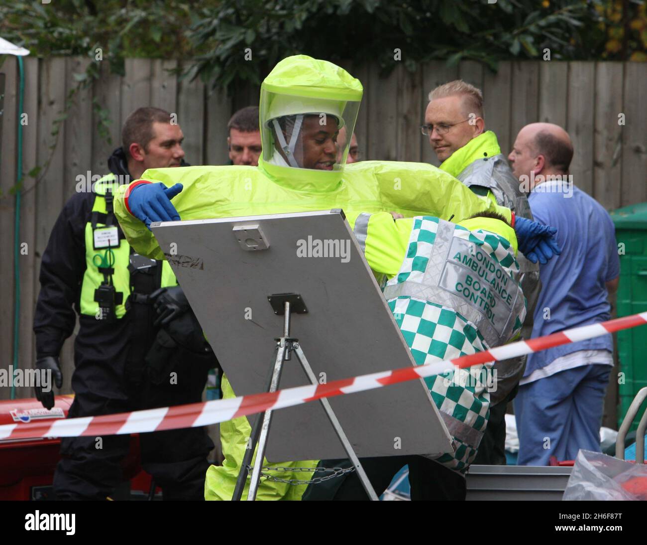 Specialist investigators prepared to enter the studio flat in Hackney ...