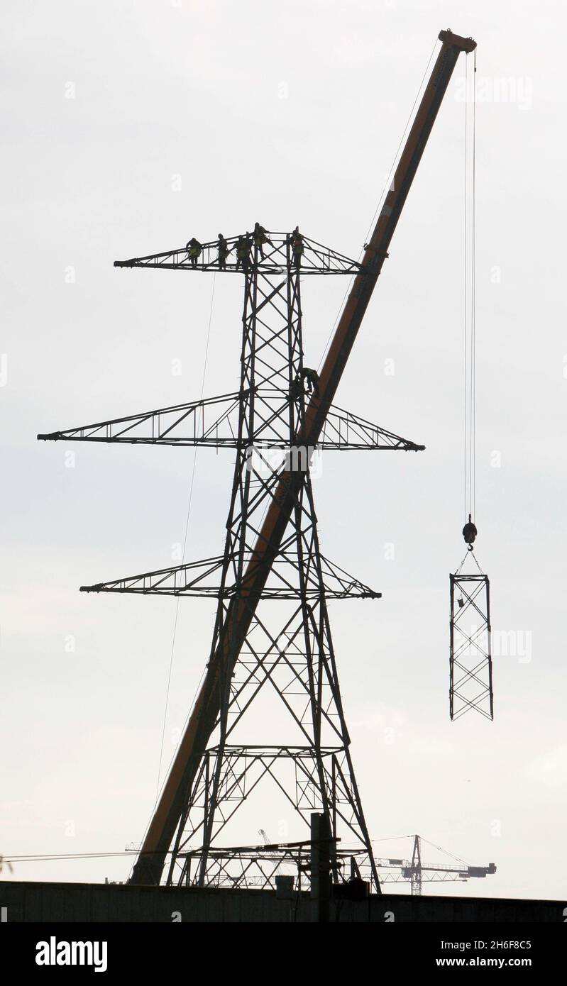 Work has begun to remove the first of 52 pylons that dominate the ...