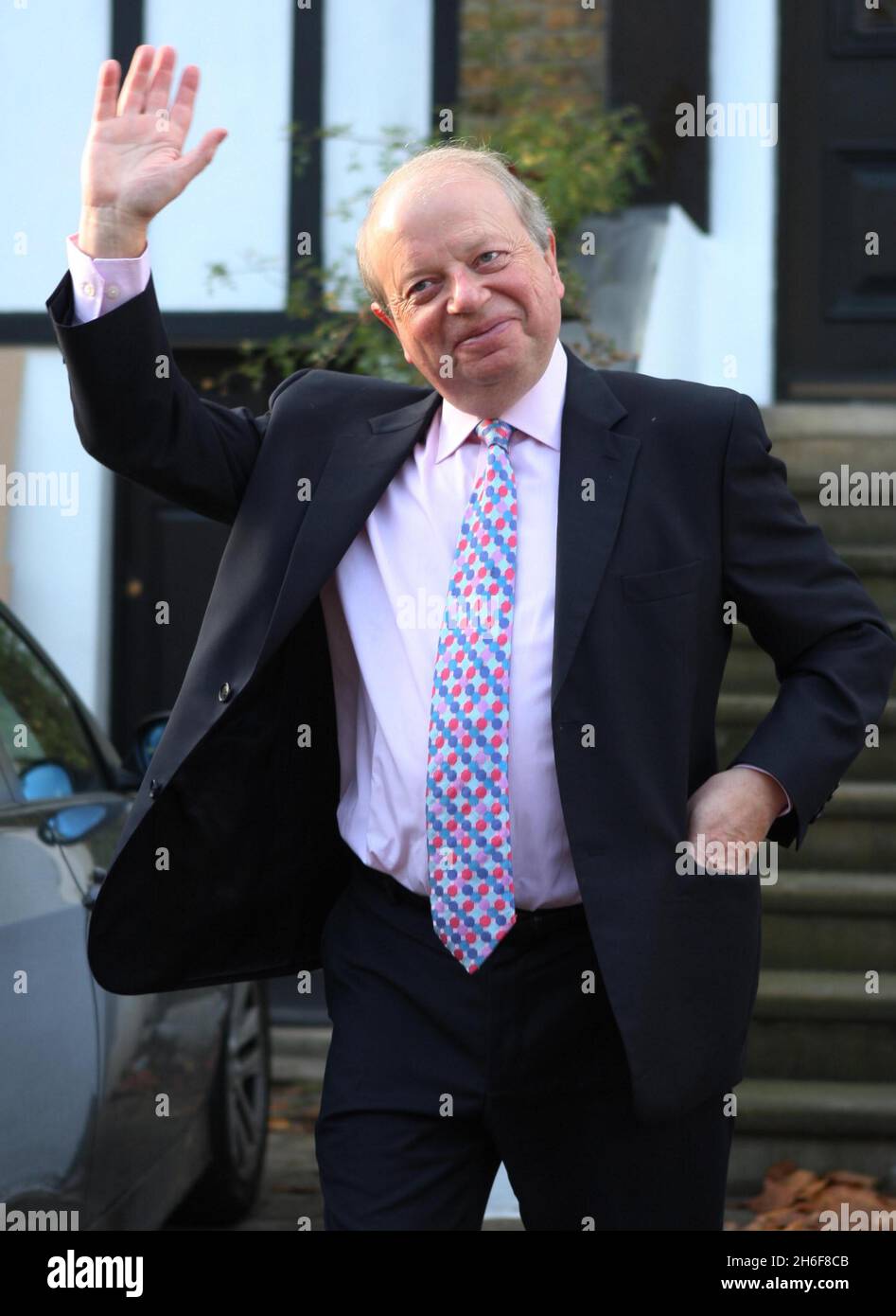 Former political journalist John Sergeant leaves his home after ...