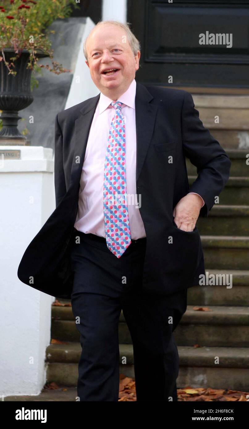 Former political journalist John Sergeant leaves his home after ...