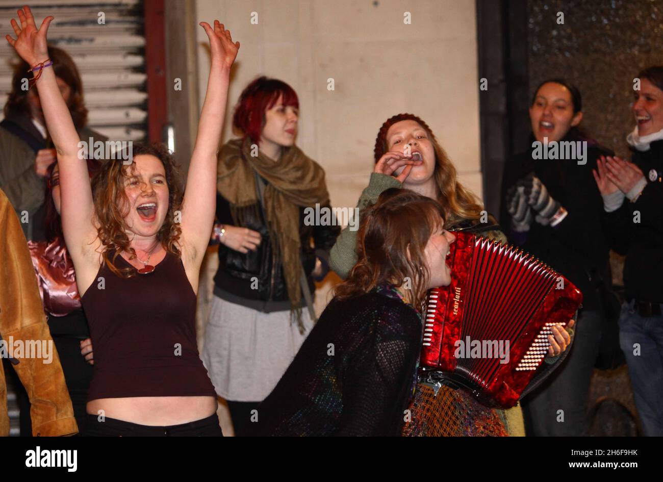 Feminists protest outside the Crystal club in London this evening where ...
