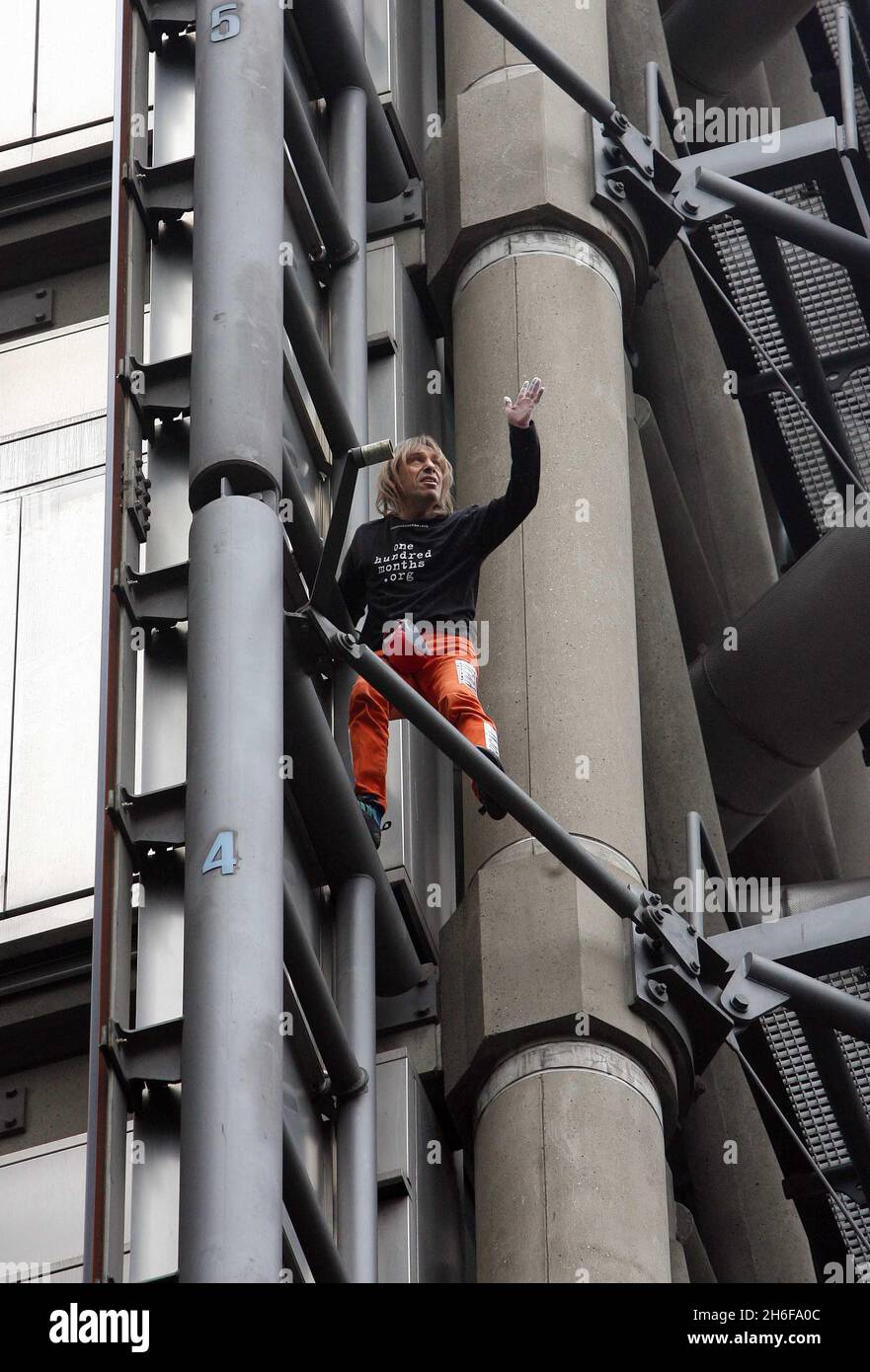 Alain Robert the "French Spider-Man" climbs the Lloyds building in ...
