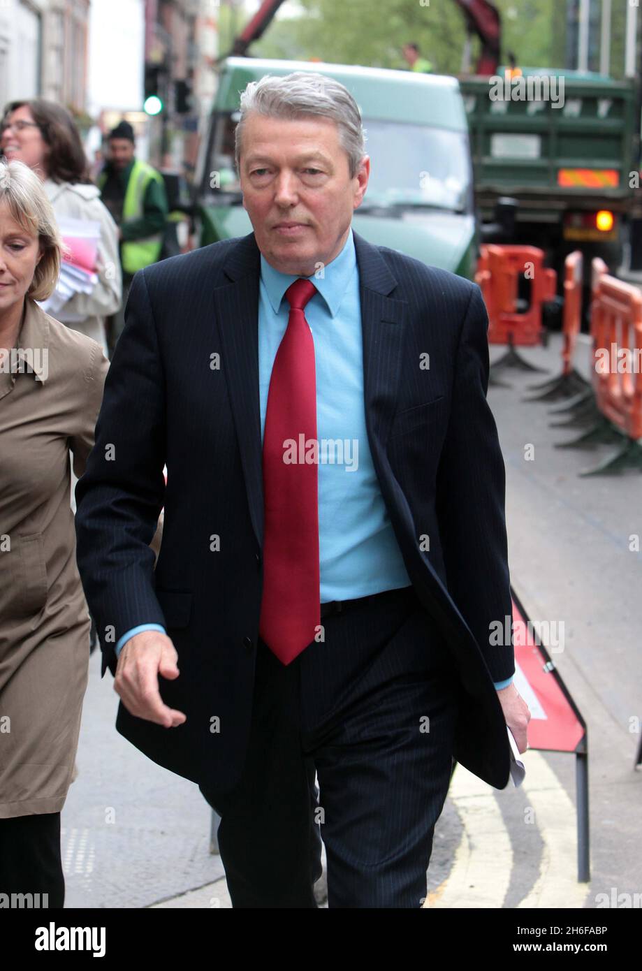 The Health Secretary Alan Johnson is pictured leaving the COBRA Swine ...