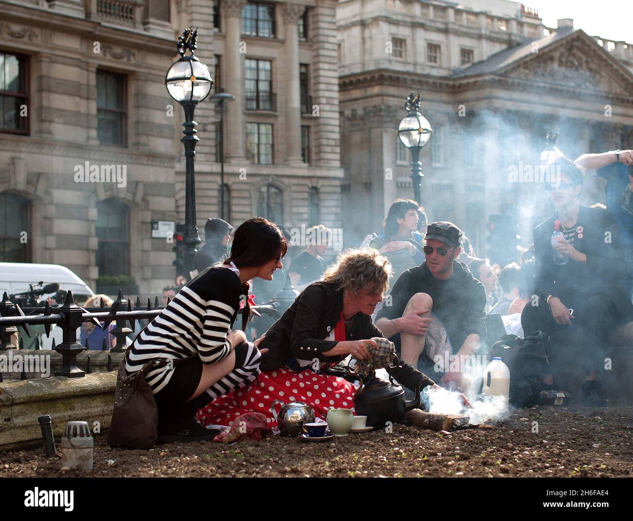 Protestors dressed as pigs and police officers during the traditional ...