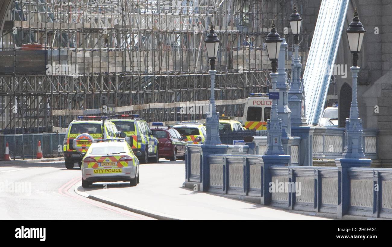 Police keep the road on London's Tower Bridge closed after an elevator ...