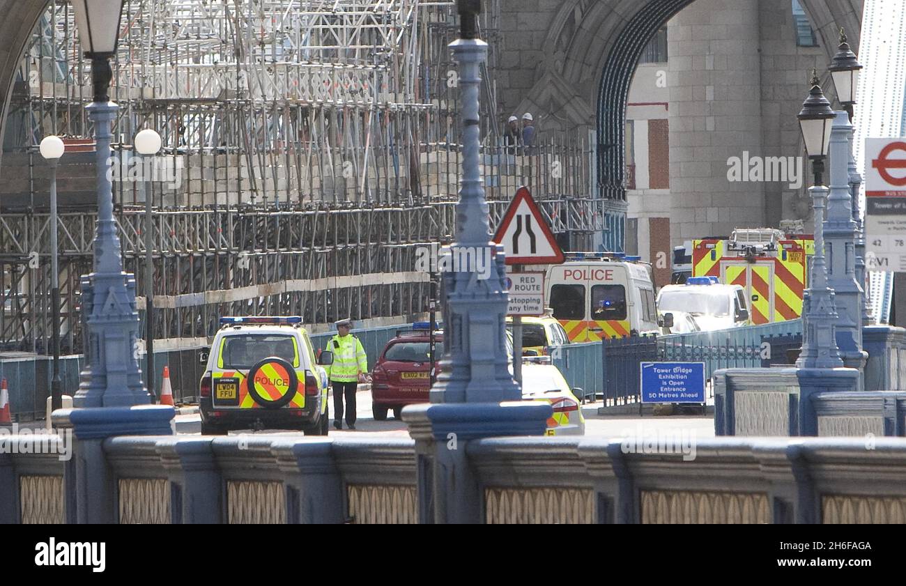 Police keep the road on London's Tower Bridge closed after an elevator ...