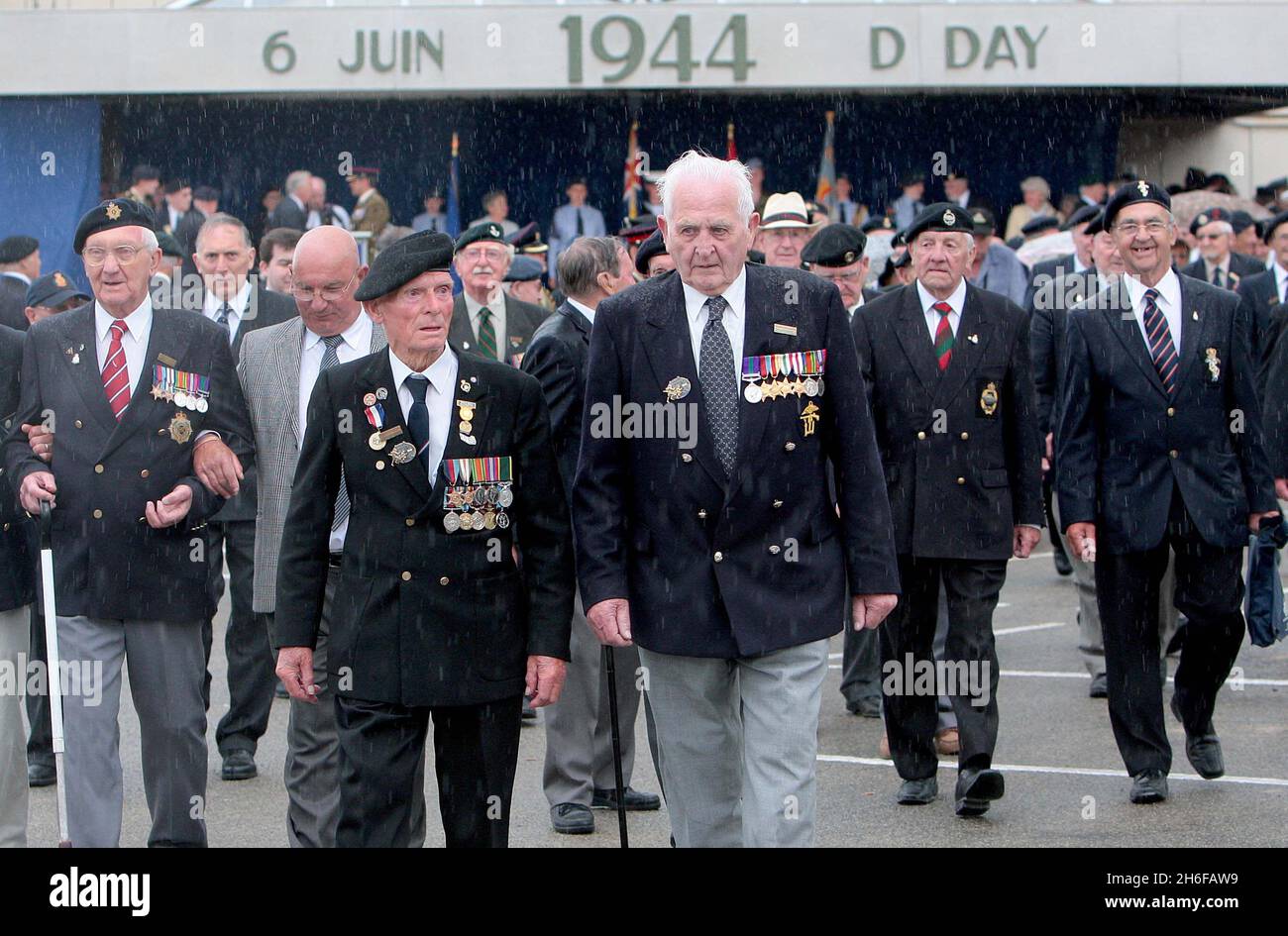 Normandy war veterans finished their march past Arromanche in France ...
